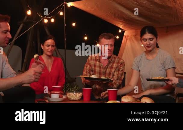 Family together celebrate holiday in garden. Family member gathering ...