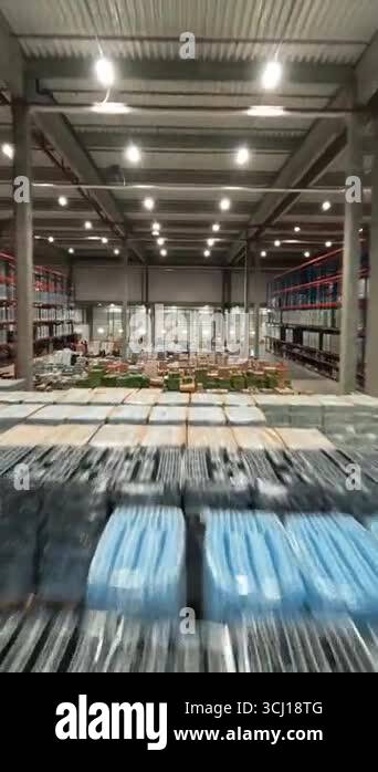 FPV drone speed view of modern retail warehouse. Logistic center ...