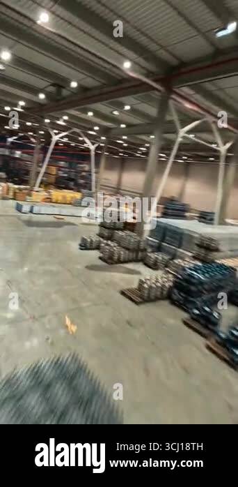 Logistic center. Large warehouse. FPV drone flight views of huge ...