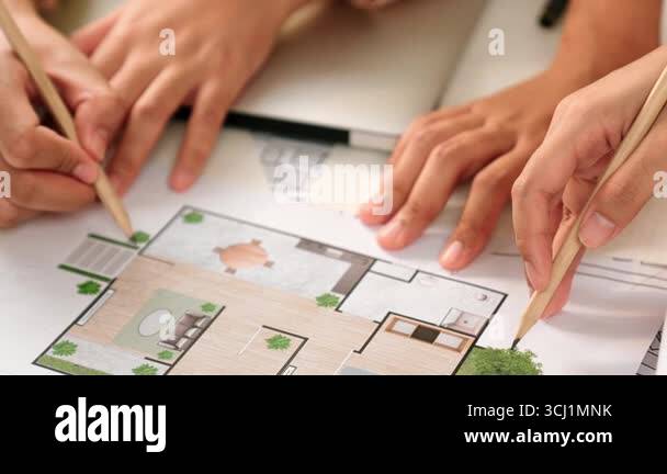 Smart architect and safety engineer discussion about building blueprint ...