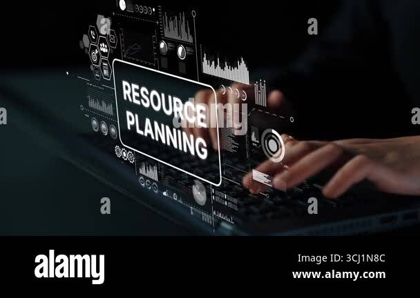 Hands Typing on Laptop with Resource Planning Graphics in Modern Office ...