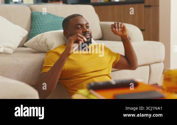 Attractive relaxed african american young man resting napping sitting ...