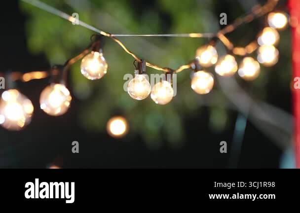 Sphere Light bulb, represent unity and harmony, on electricity wire ...