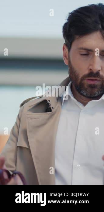 Face angry business man use smartphone look at watch feel frustrated at ...