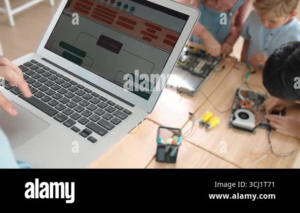 Top view of smart caucasian teacher coding engineering prompt and ...