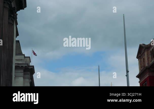 British flag waving near historic museum building Stock Video Footage ...