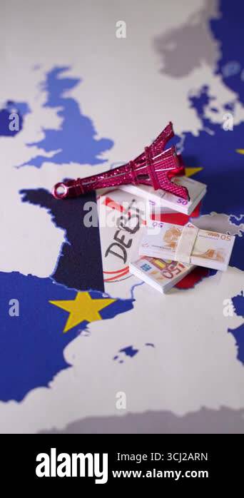 Eiffel Tower souvenir and euro banknotes on France and European Union ...