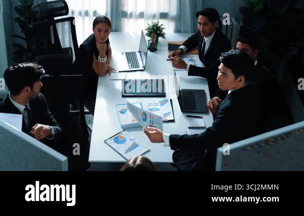 Top view of smart executive manager financial graph to diverse team ...