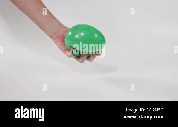 Squeezing balloon Stock Videos & Footage - HD and 4K Video Clips - Alamy