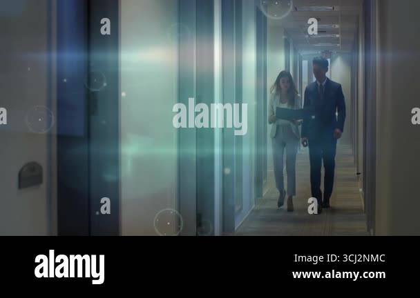 Coworkers walking corridor flipping chart page activating digital ...