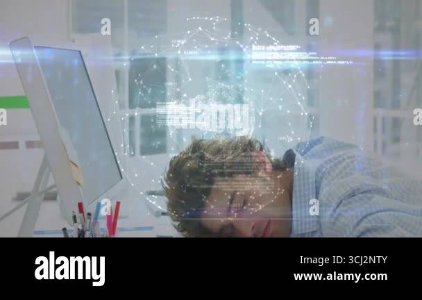 Man gazing at monitor and activating rotating digital globe while ...