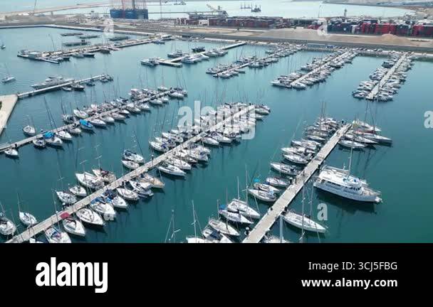 Aerial drone view of Marina Valencia with boats, yachts, and waterfront ...