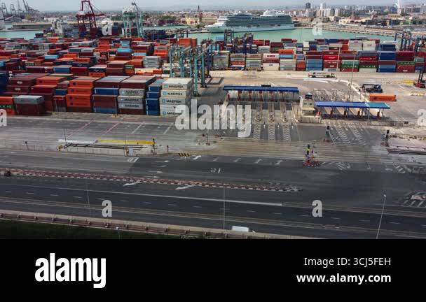 Aerial drone view of Valencia commercial port with shipping containers ...