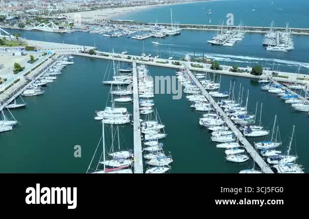 Aerial drone view of Marina Valencia with boats, yachts, and waterfront ...