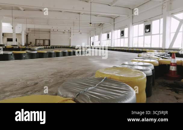 Indoor static view go kart racing circuit with empty track, safety ...