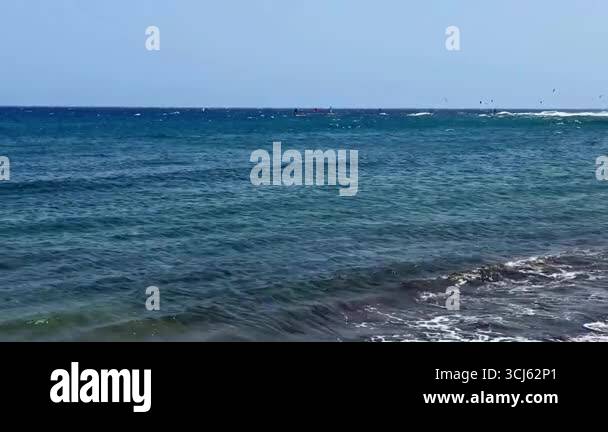 Experience the stunning view of the ocean waters featuring scenic waves ...