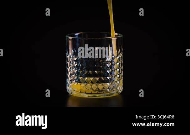 Orange juice being poured into a glass Stock Video Footage - Alamy