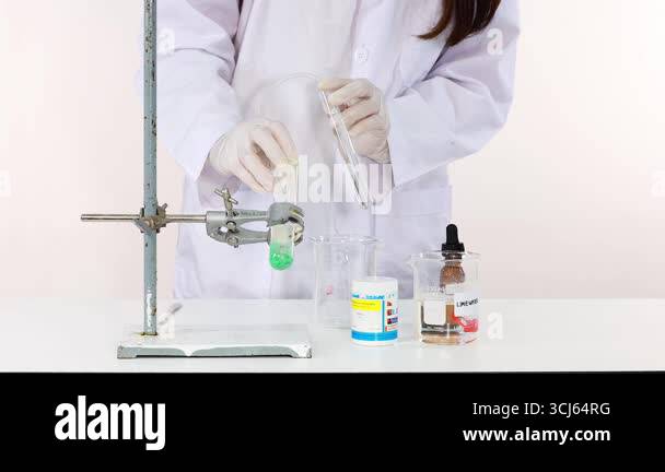 Chemical reaction demonstration in a laboratory setting Stock Video ...