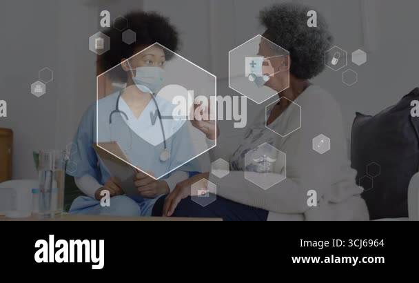 Nurse pointing finger beside patient, activating health overlays ...