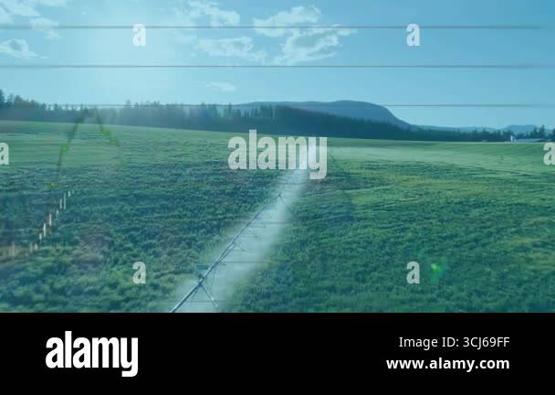 Starting pivot arm rotation spraying water data overlay rising with ...