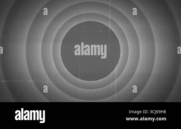 Displaying concentric rings expanding, stylized title fading over ...