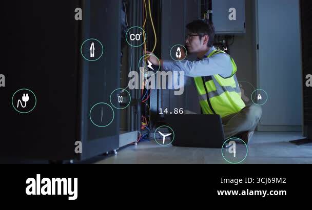 Tech kneeling at rack tracing cables showing energy icons, making ...