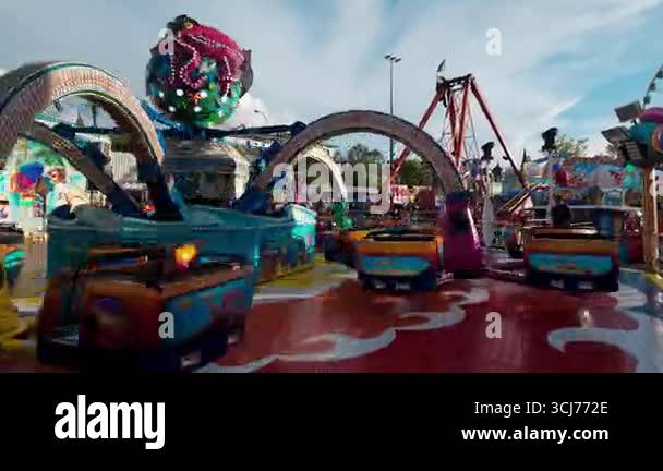 LUXEMBURG, EUROPE - SEPTEMBER 1, 2025 - Colorful carousel with octopus ...