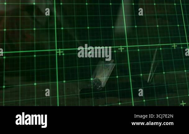 on startup scan line moving leftward across metal fragment under green ...