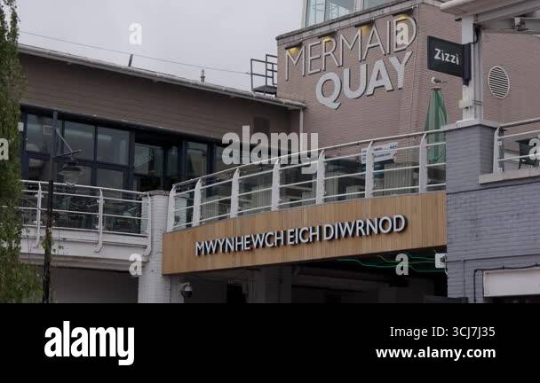 CARDIFF, UK - AUGUST 8, 2025 - Exterior view of Mermaid Quay shopping ...