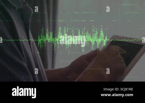 Mature male user tapping tablet screen and causing green waveform ...
