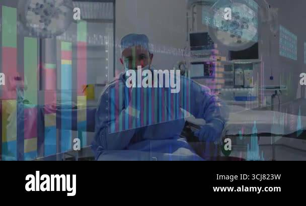 Surgeon analyzing scrolling digital charts in operating room for ...