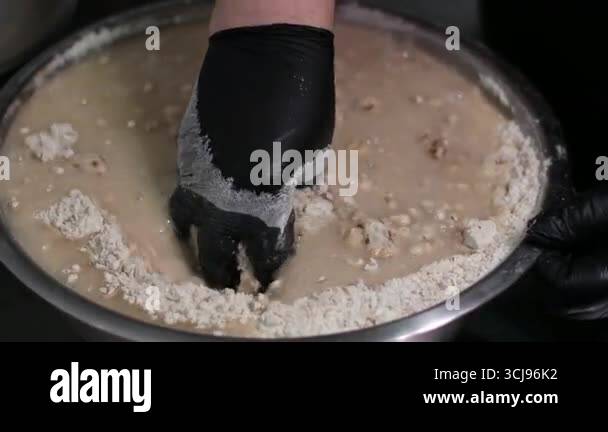 bread making process womens hands mixing dough and writing bread Step ...