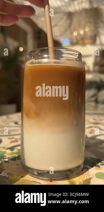 One Person Mixes with a Teaspoon a Cup of Flavored Coffee with Fresh ...