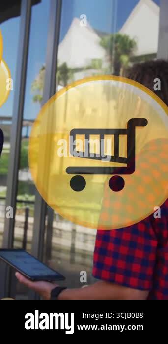 Animation of shopping cart icons over diverse coworkers discussing ...