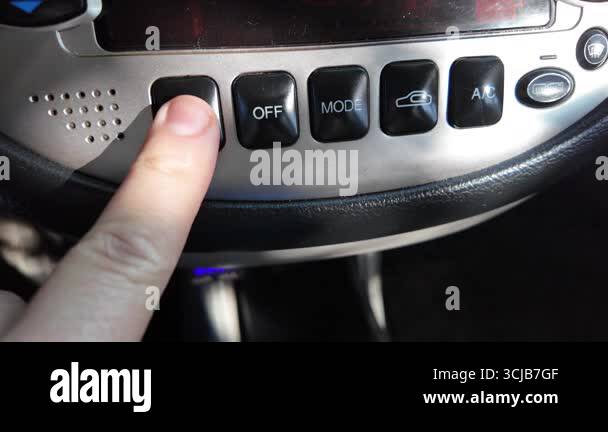 analog car buttons. Man finger pressing play button on vintage tape ...