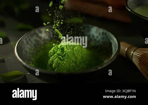 Super Slow Motion Shot of Falling Matcha Powder into a Heap with Camera ...