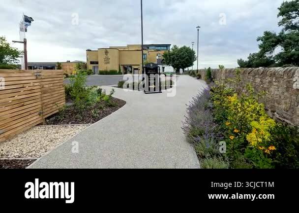 Pathway leading to hotel entrance in St Andrews Stock Video Footage - Alamy