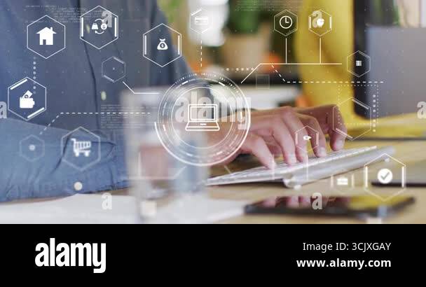 Mid adult man typing keyboard and starting headset call while ...