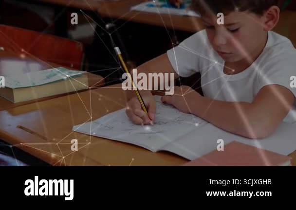 Boy student opening school workbook and learning drawing shapes ...