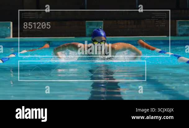 Female swimmer swimming butterfly stroke facing camera, activating ...