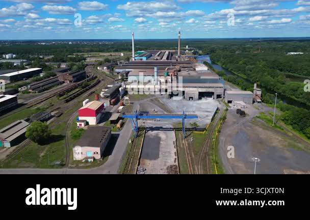 Aerial view of Hennigsdorf electric steel factory with train tracks ...