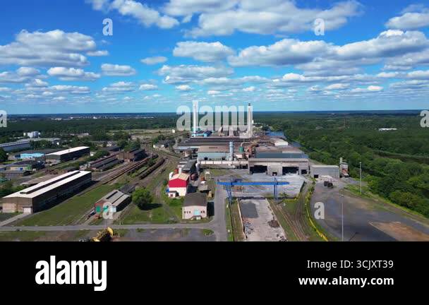 Aerial view of Hennigsdorf electric steel factory with train tracks ...