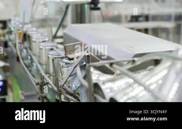 Empty and clean aluminum cans are selected and transported down the ...