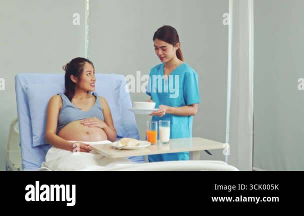 Nurses take care pregnant women during childbirth prepare food place ...
