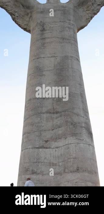 Low-angle view of the Christ the Redeemer statue in Maratea, Basilicata ...