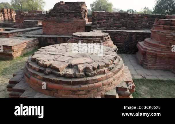 sarnath ruins with excavated small buddhist meditation stupa in ...