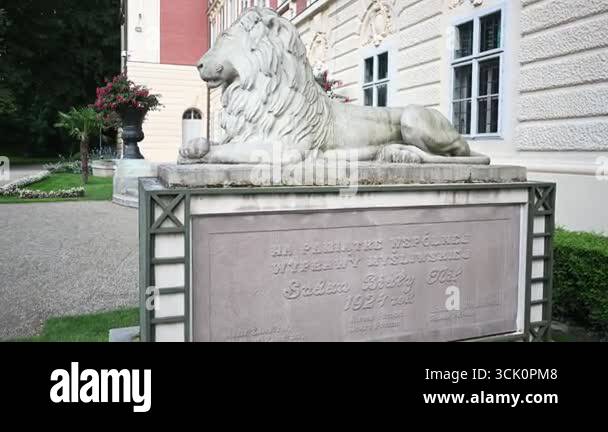 Lancut, Poland - August 22, 2025: A magnificent stone lion sculpture ...