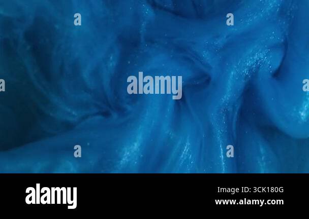 Smog ink. Vapor cloud. Defocused blue color splash in water explosion ...