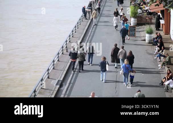 PARIS, FRANCE - OCTOBER 09, 2024: people walking, jogging, and cycling ...
