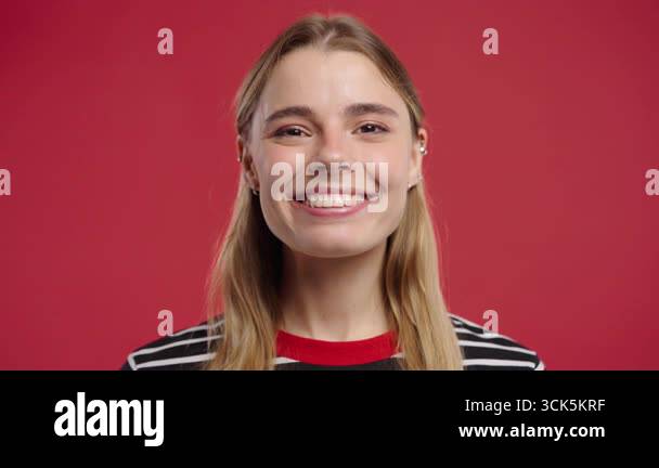 Charming young female smiling at camera, confidence and light ...